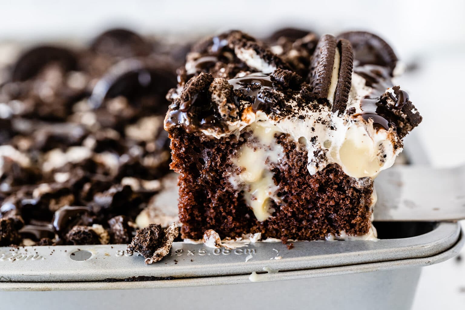 How To Make Our All-Time Favorite Oreo Poke Cake